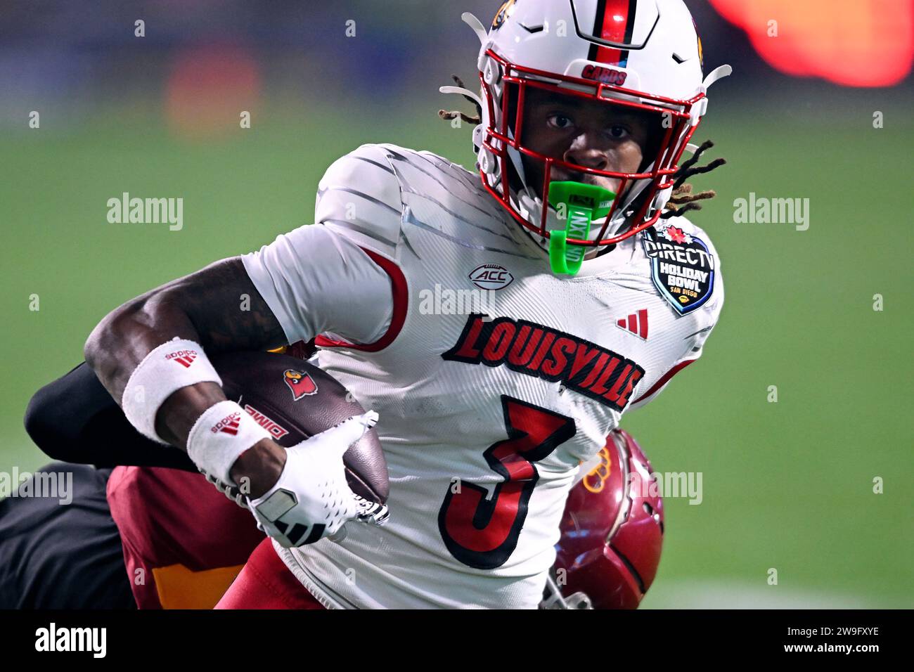 Louisville wide receiver Kevin Coleman (3) is tackled by Southern ...