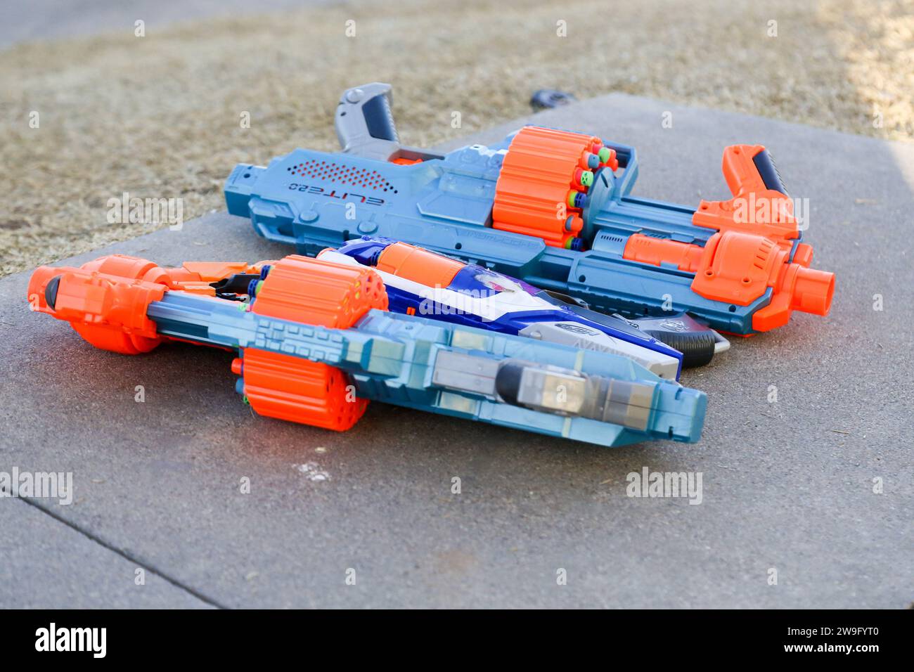 Nerf guns lay on the ground at the Gilbert Nerf Wars Tournament held at ...
