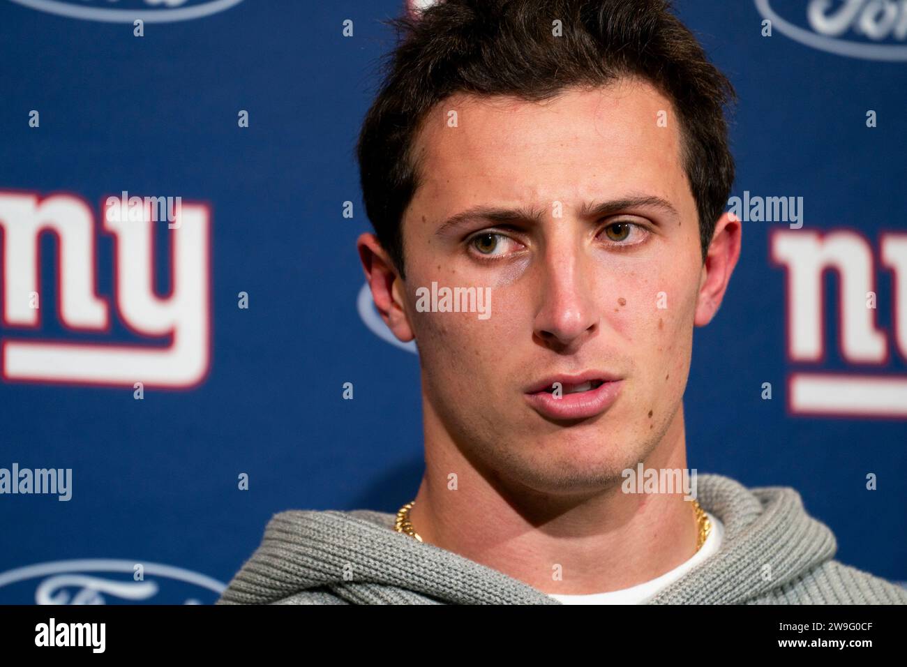 New York Giants quarterback Tommy DeVito (15) talks to be media ...