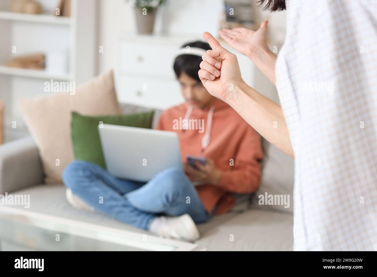 Parents arguing with their teenage son at home, closeup. Family problem ...