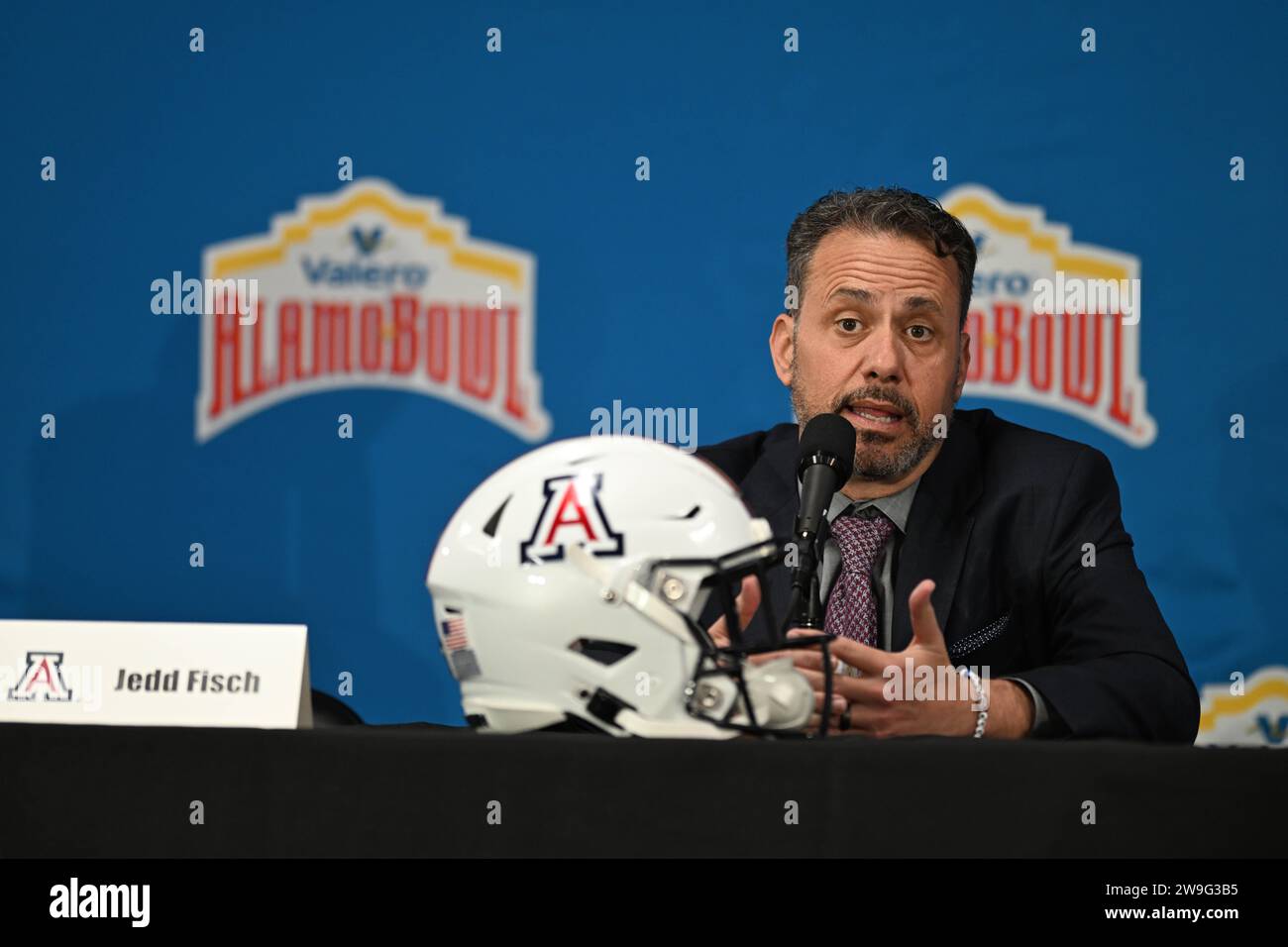 San Antonio, TX, USA: Arizona Wildcats head coach Jedd Fisch speaks to ...