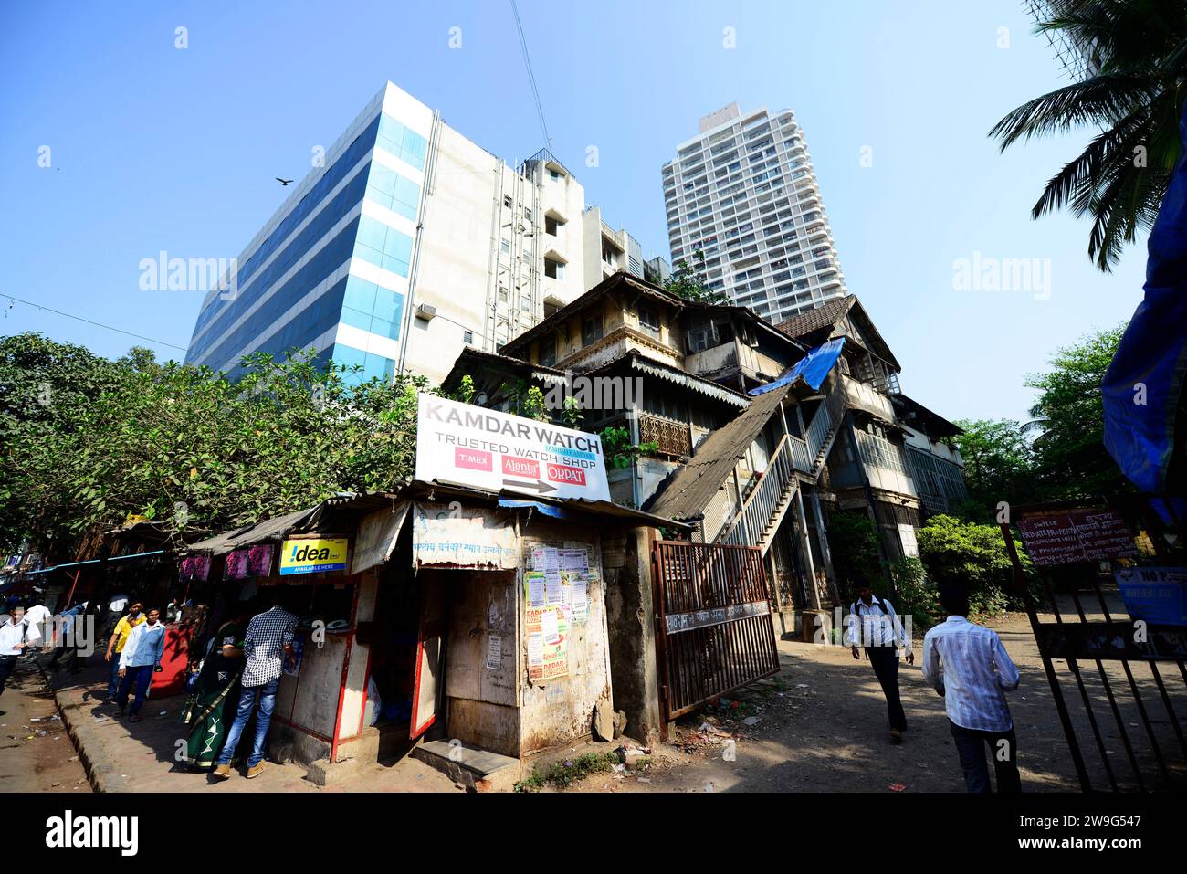 Modern buildings riding above old ones in Dadar East, Mumbai, India ...