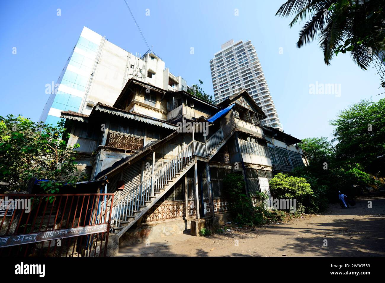 Modern buildings riding above old ones in Dadar East, Mumbai, India ...