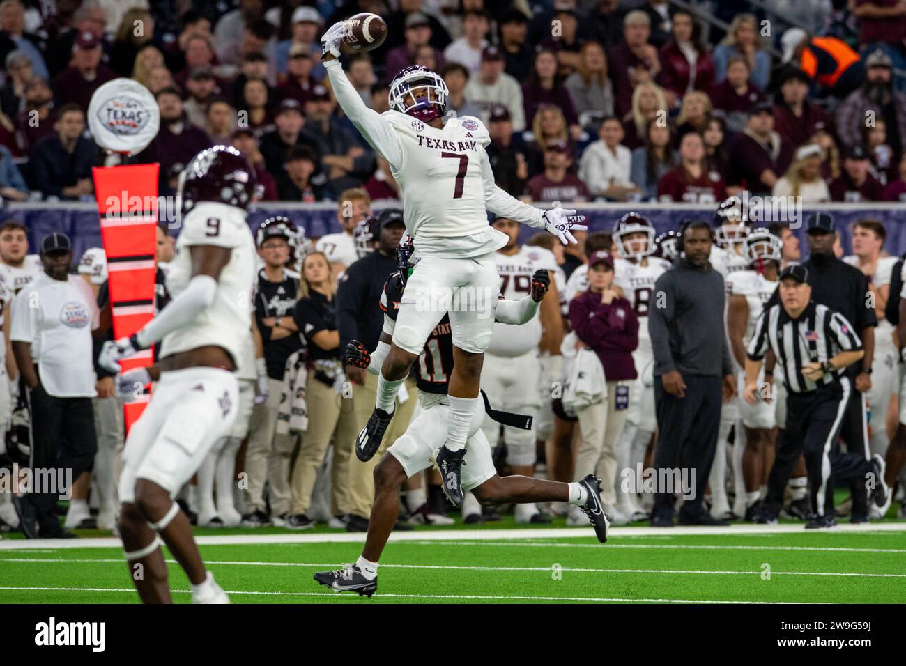 Houston, TX, USA. 27th Dec, 2023. Texas A&M Aggies wide receiver Moose ...