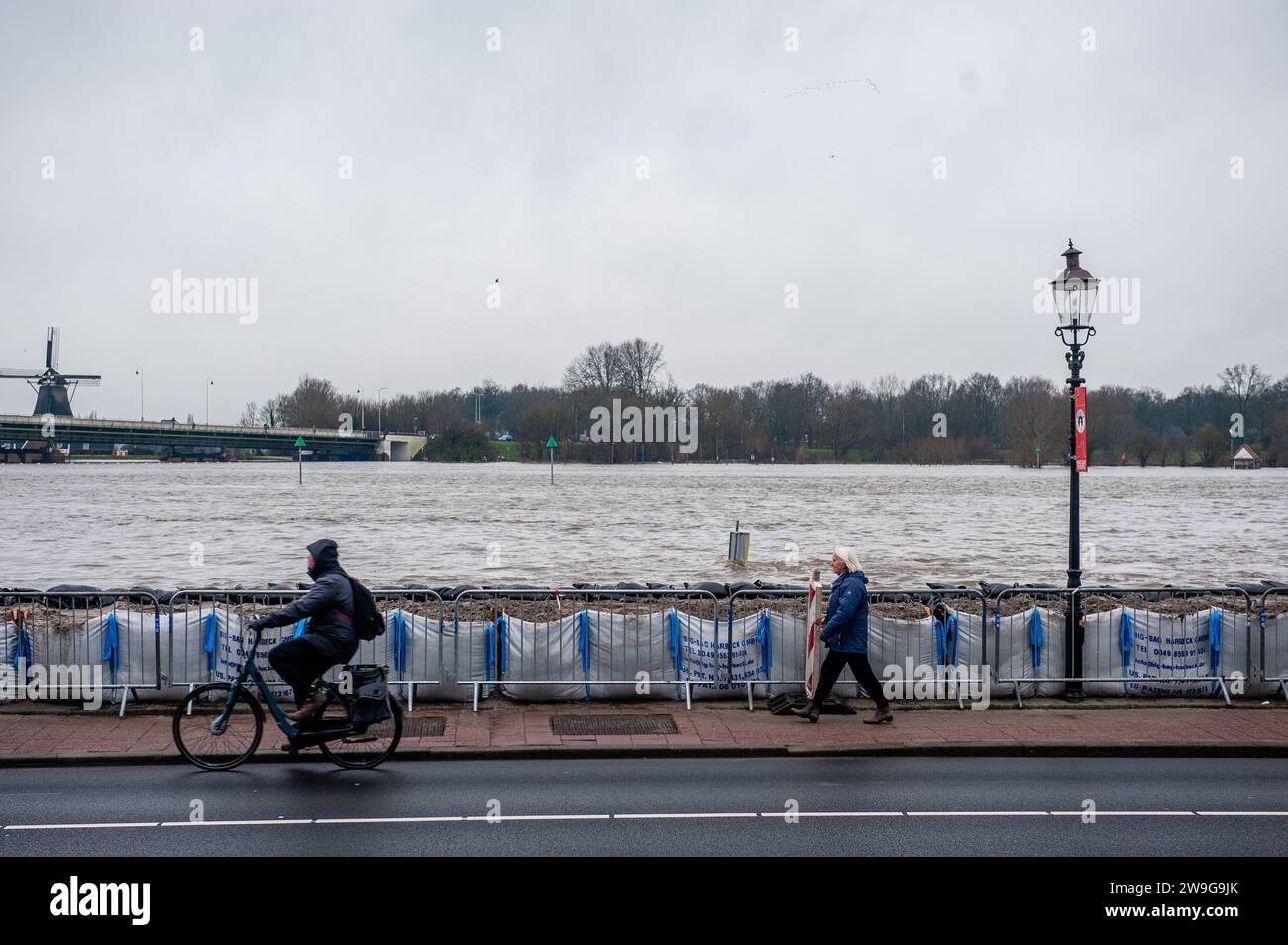 Deventer, Netherlands. 27th Dec, 2023. People are seen passing by close ...