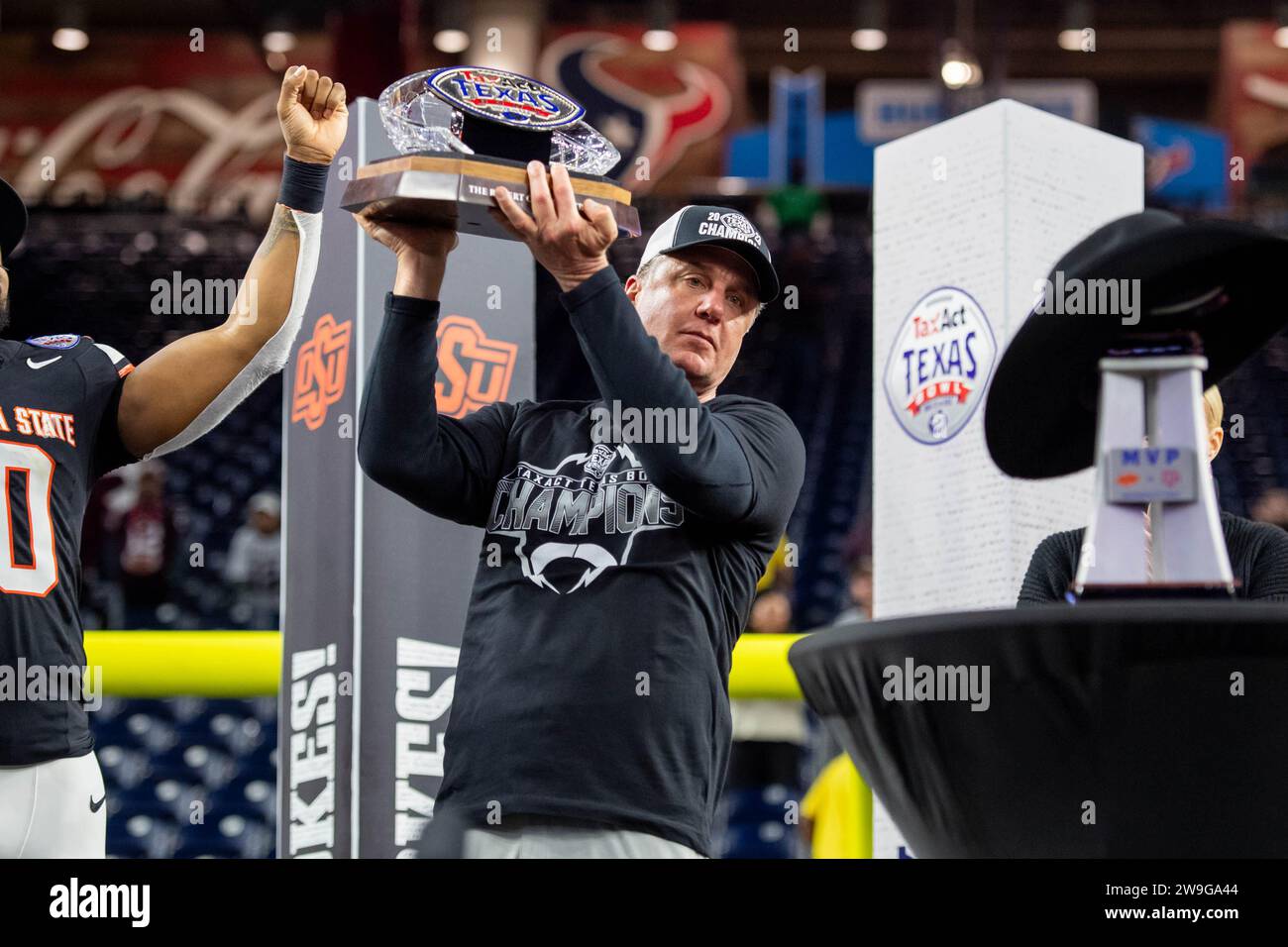 Houston, TX, USA. 27th Dec, 2023. Oklahoma State Cowboys head coach ...
