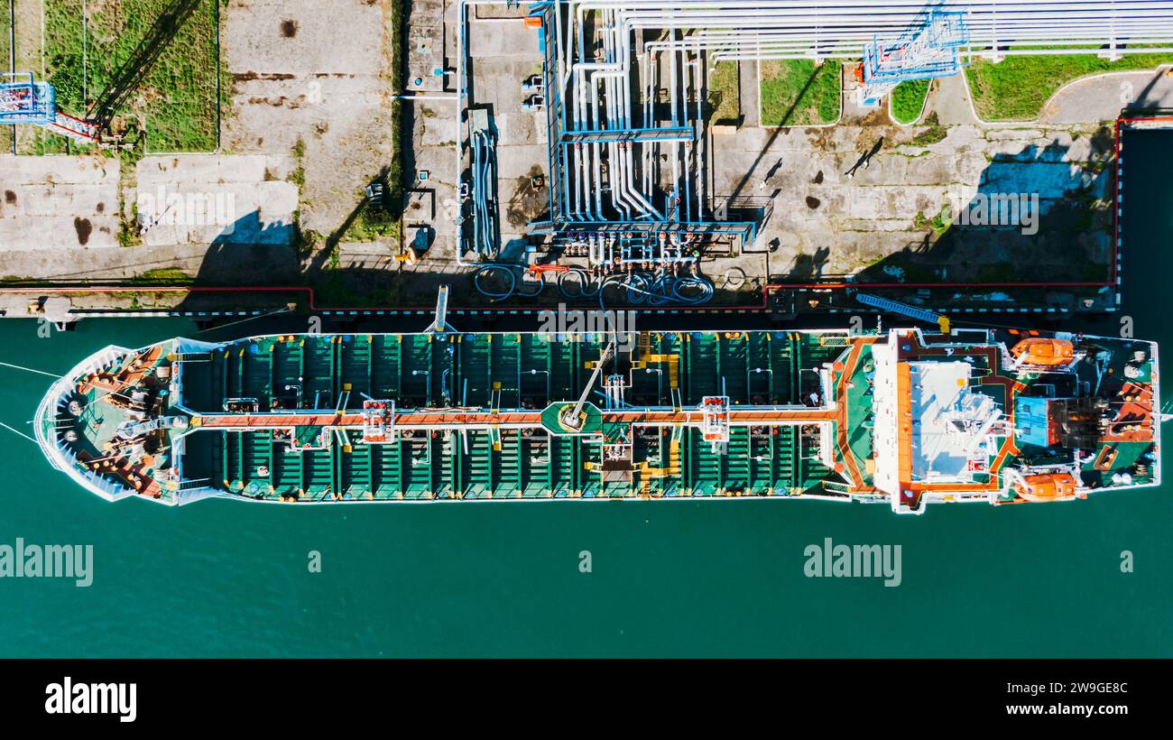 Huge cargo ship at port. Bunkering, refueling vessel for onward journey ...
