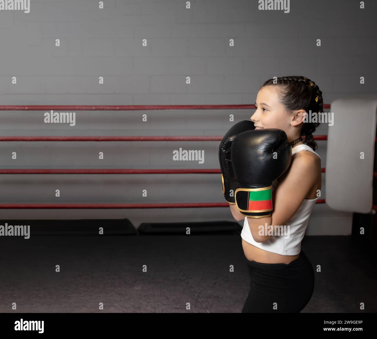 Strong girl in boxing gloves hi-res stock photography and images - Alamy