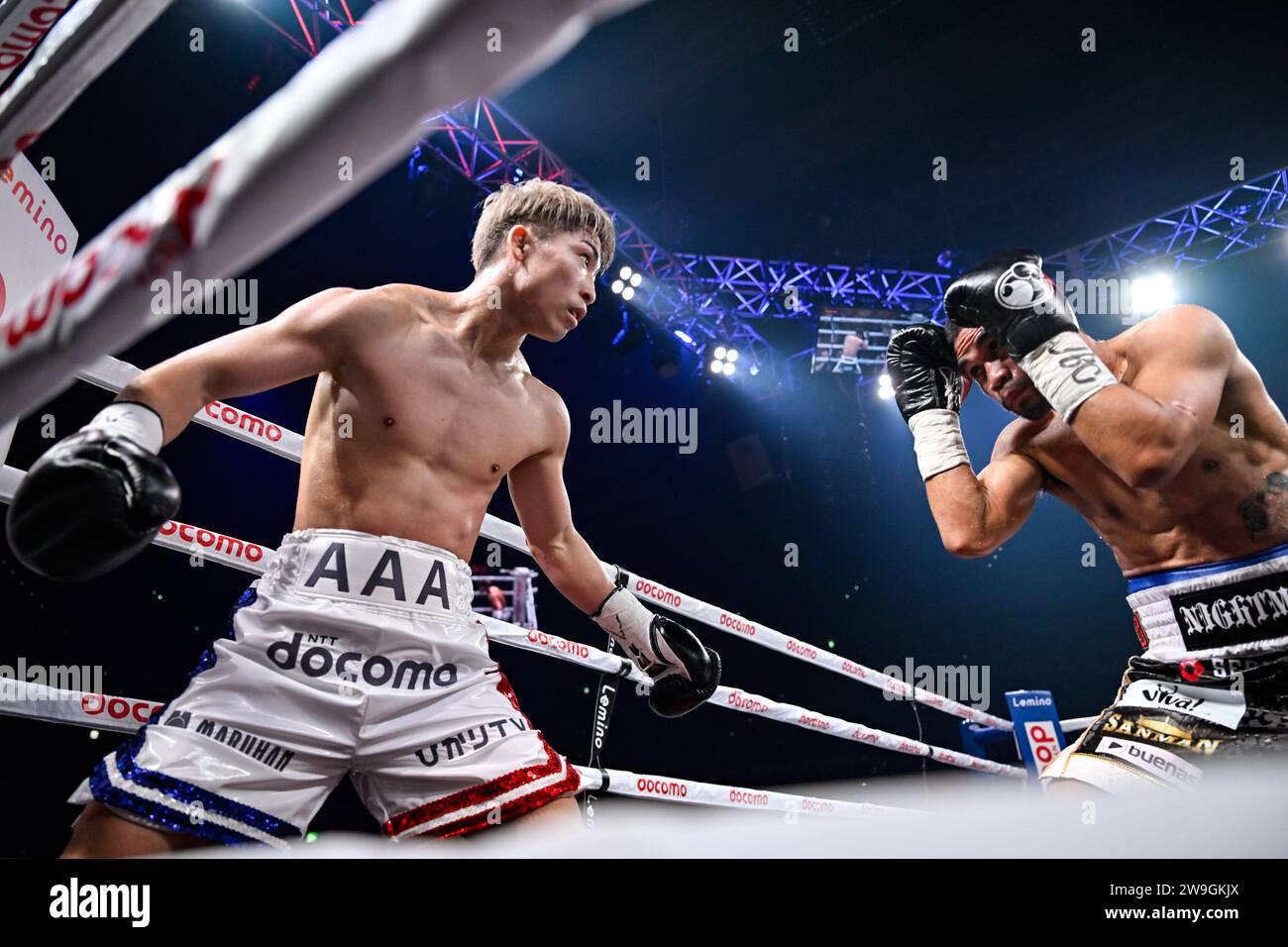 WBC and WBO super bantamweight champion Naoya Inoue (L) of Japan and WBA and IBF super ...