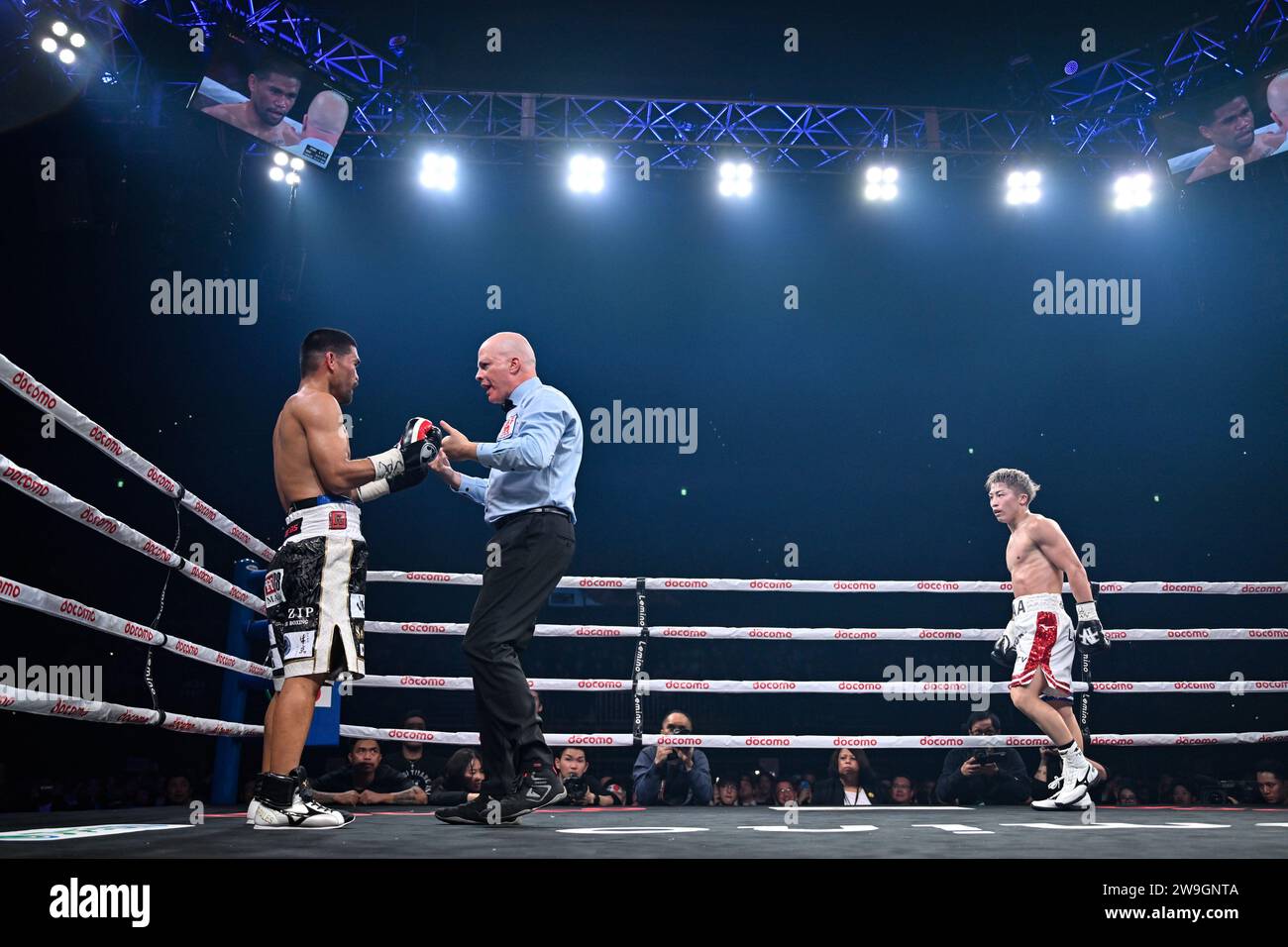 WBC and WBO super bantamweight champion Naoya Inoue (R) of Japan knockes down WBA and IBF super ...
