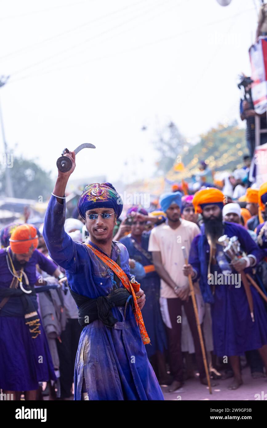 Sikh male (Nihang Sardar) performing martial art as culture during the ...