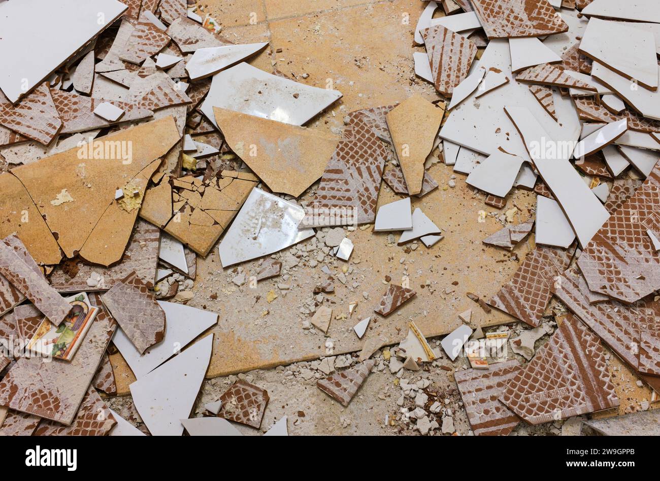 Top view of the floor of a house under demolition with pieces of broken ...