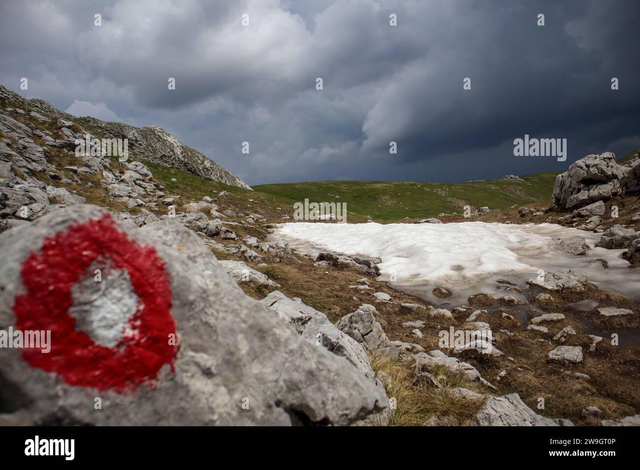 The beauty of untouched wilderness showcased in a panoramic mountain spectacle Stock Photo - Alamy