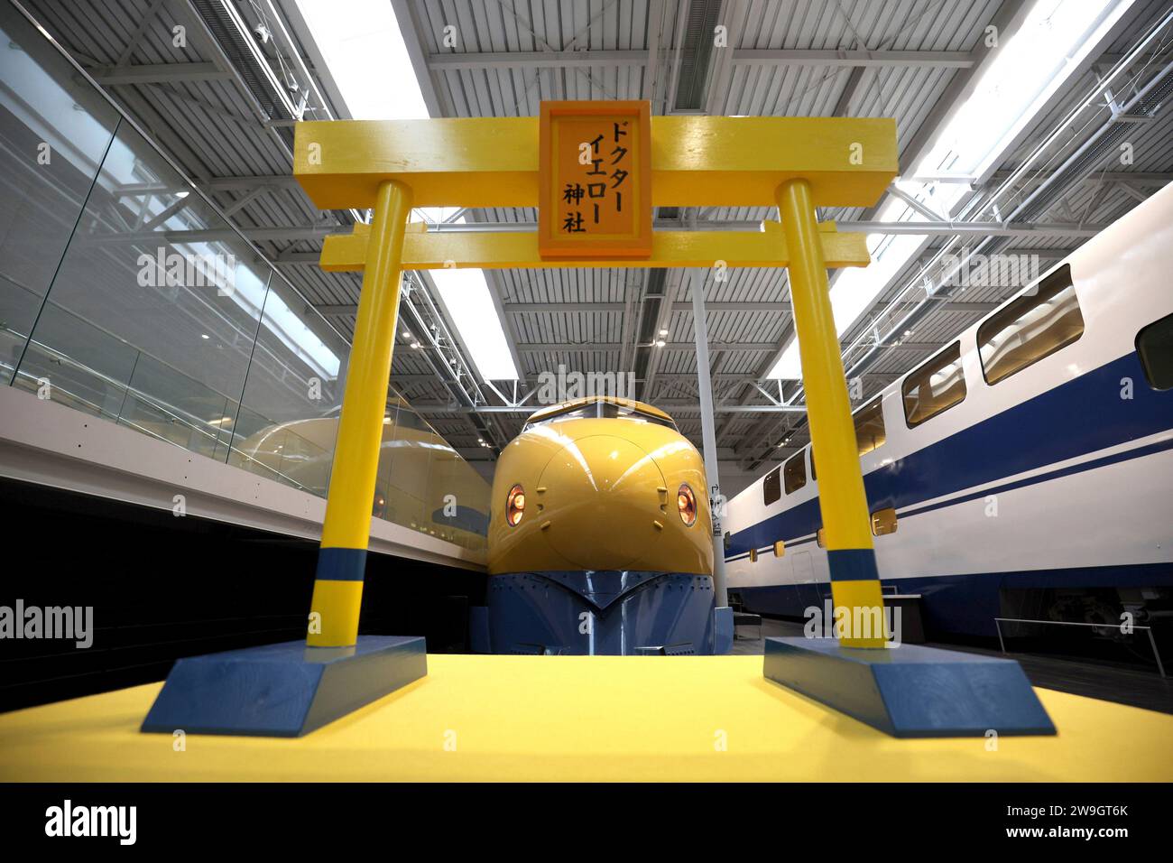 Doctor Yellow Shrine is set in front of Doctor Yellow train at SCMAGLEV ...