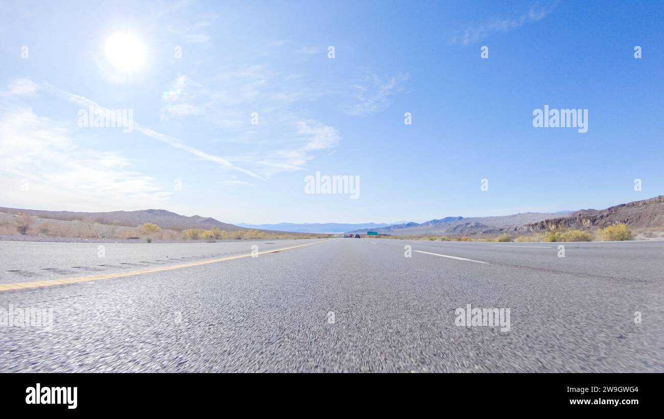Daytime Road Trip: Nevada to California on HWY 15 Stock Photo - Alamy