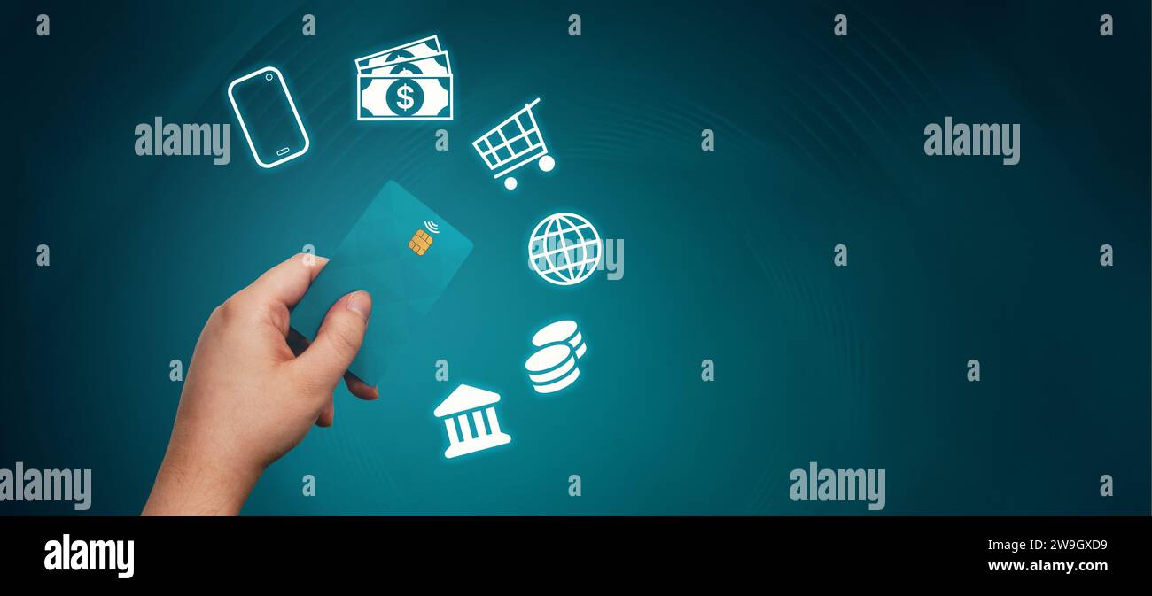 Header of female hand showing credit card over dark green background ...