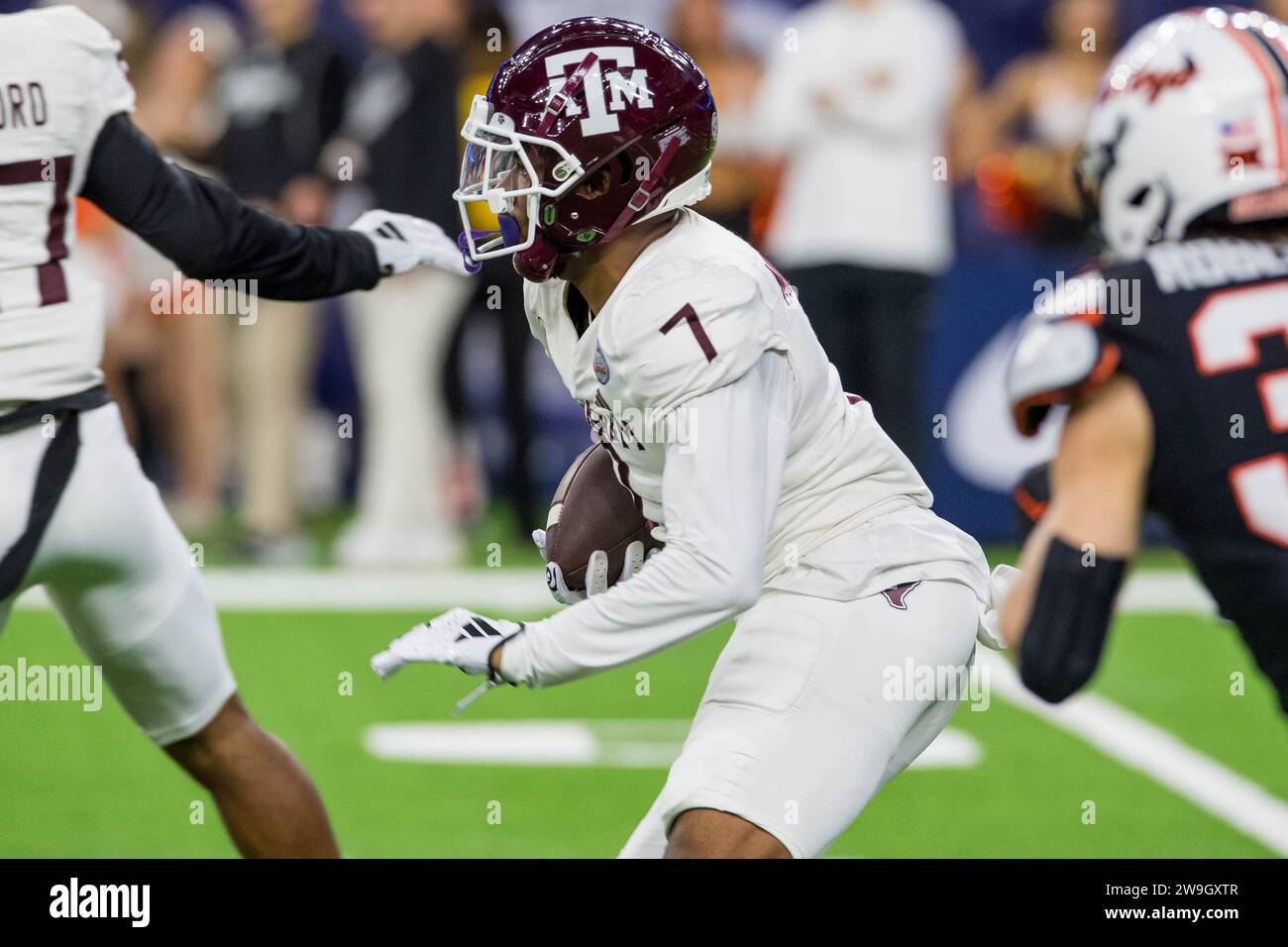 Houston, TX, USA. 27th Dec, 2023. Texas A&M Aggies wide receiver Moose ...