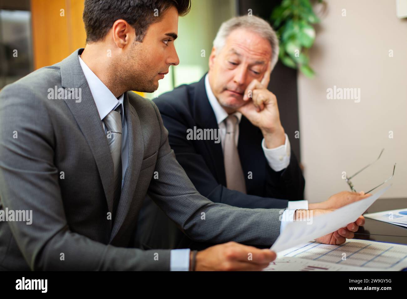 Discussing financial charts hi-res stock photography and images - Alamy