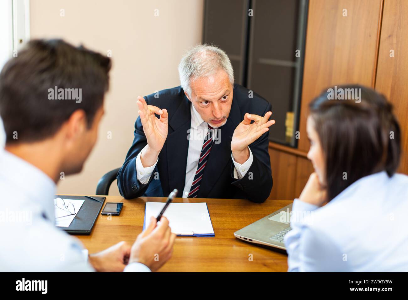 Group of angry people talking hi-res stock photography and images - Alamy
