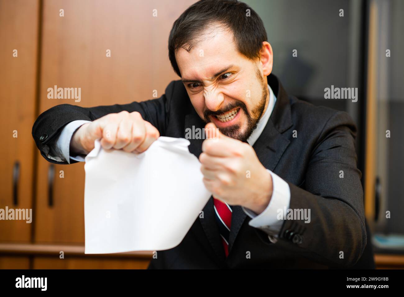Angry man sheet paper hi-res stock photography and images - Alamy