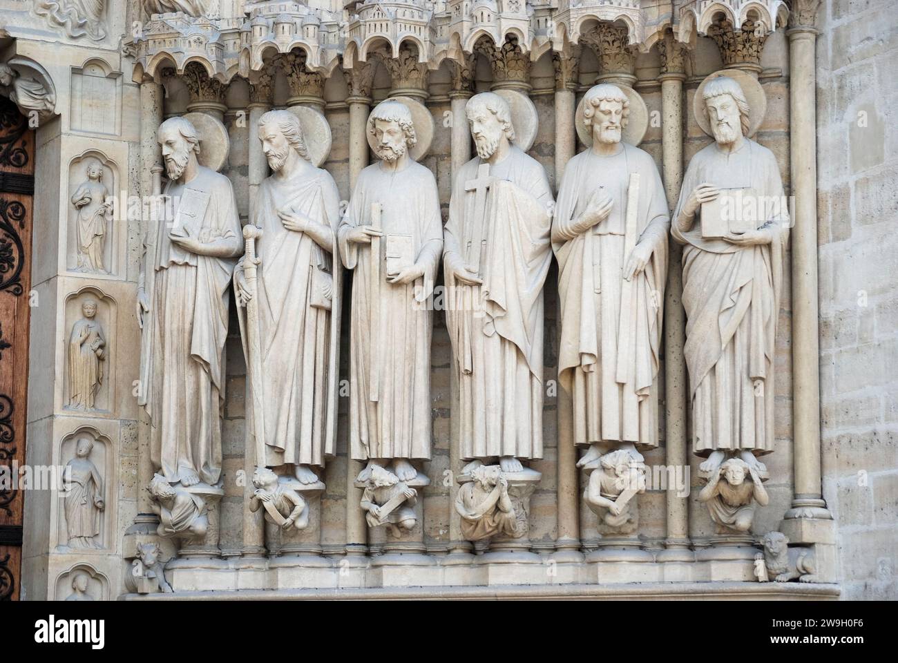 Stonework carvings in the wall of Notre Dame Cathedral, Paris, France ...