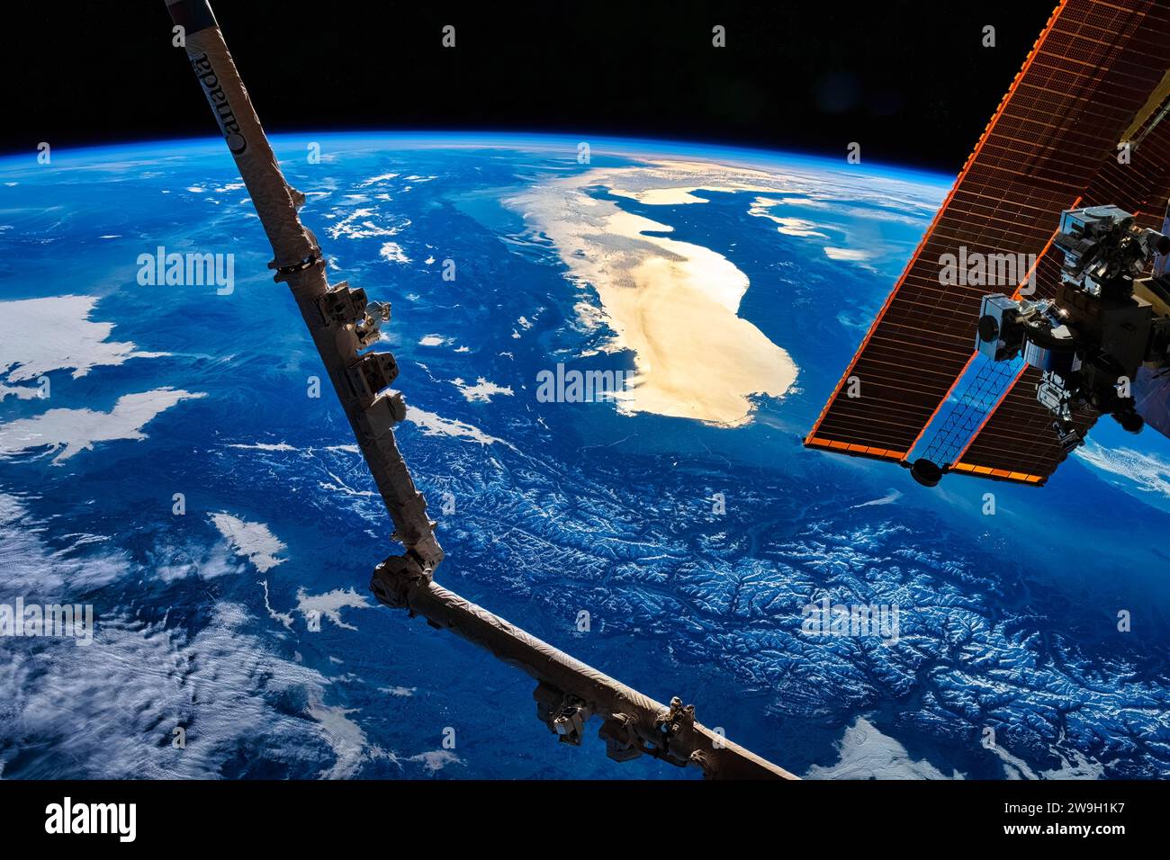 Part of the ISS and planet Earth. Digital enhancement of a NASA image ...