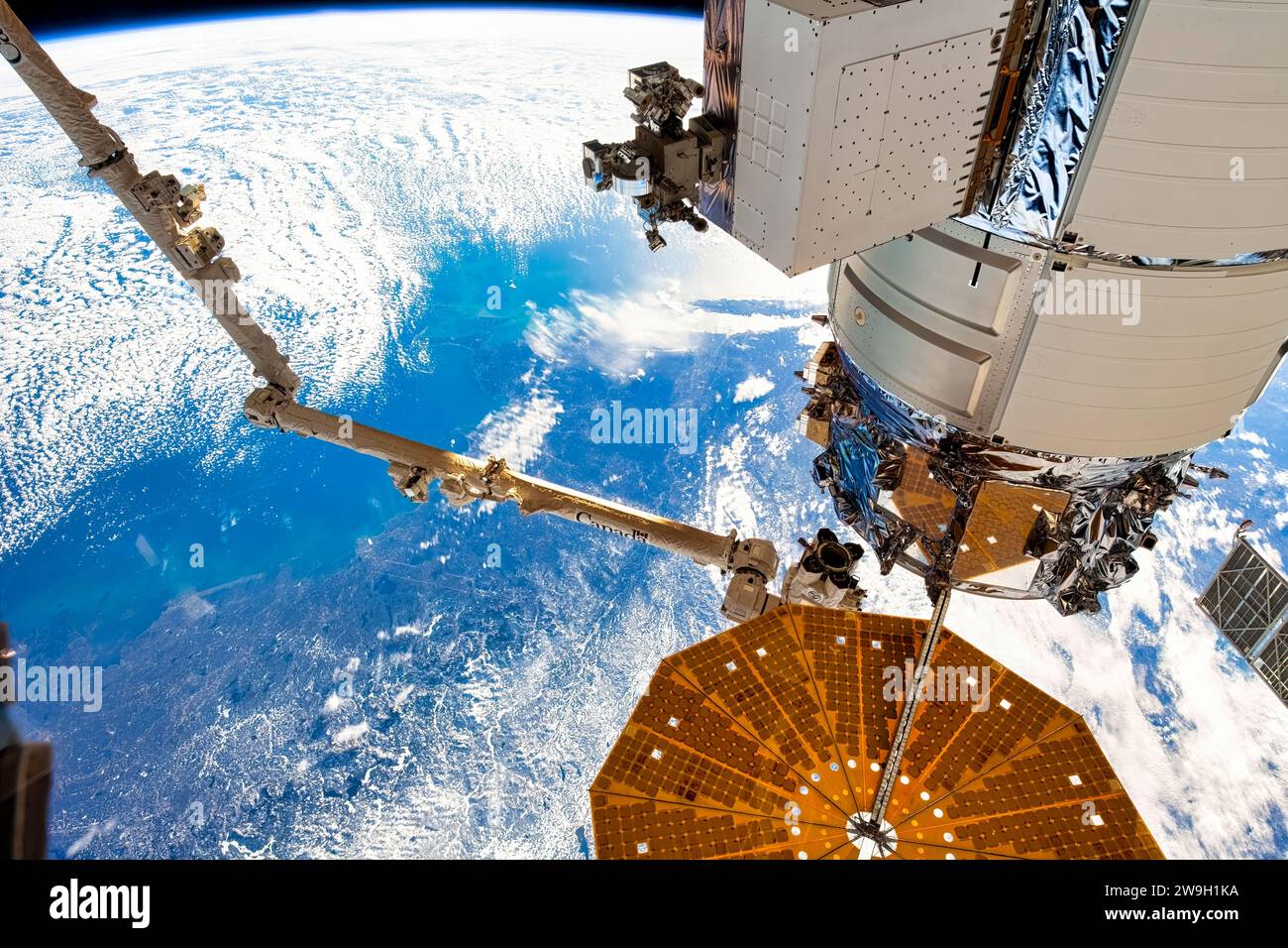 Part of the ISS and planet Earth. Digital enhancement of a NASA image ...