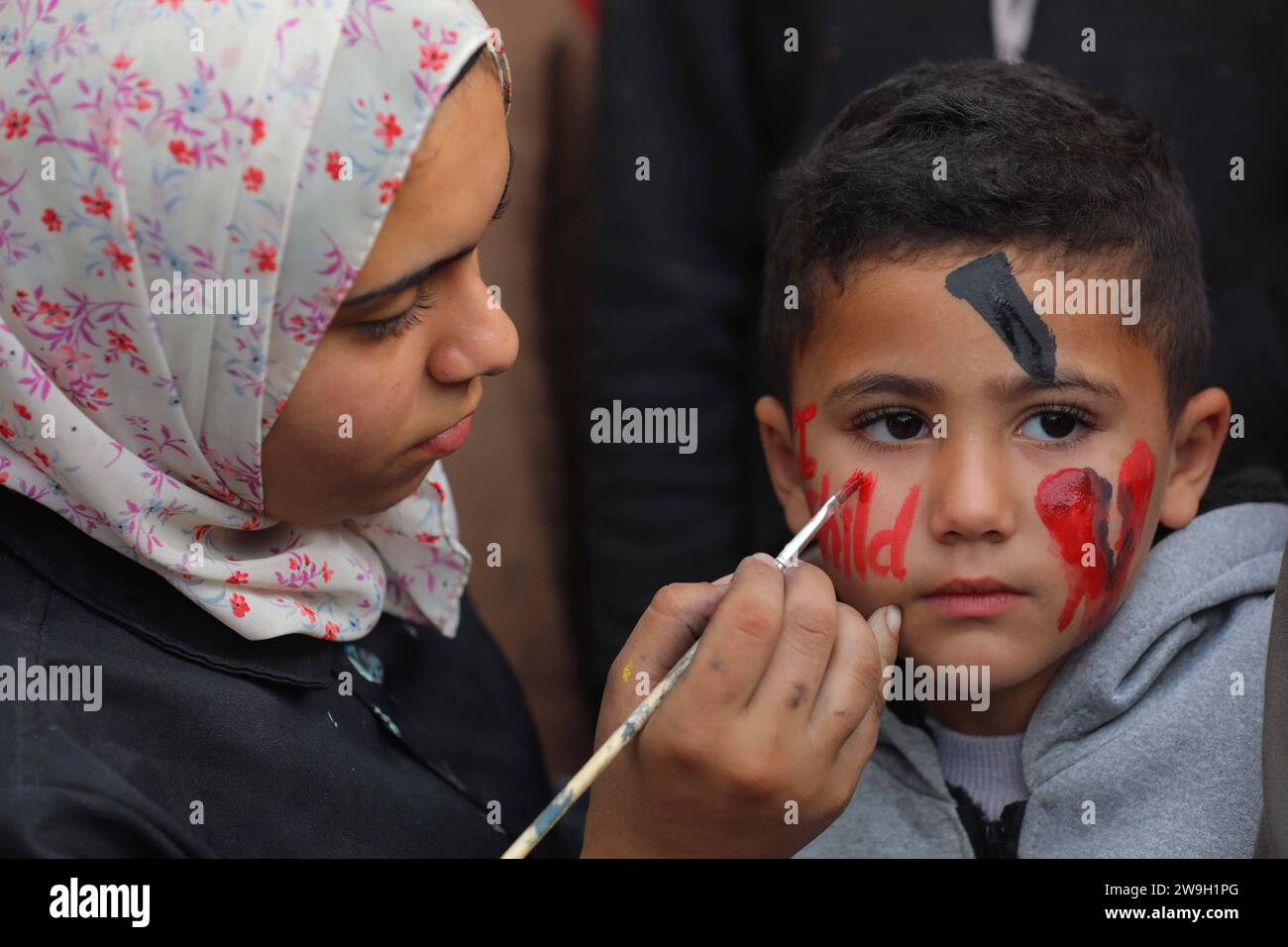 Palestinian artist Menna Allah Hamouda, 20, is drawing 2024 and ...