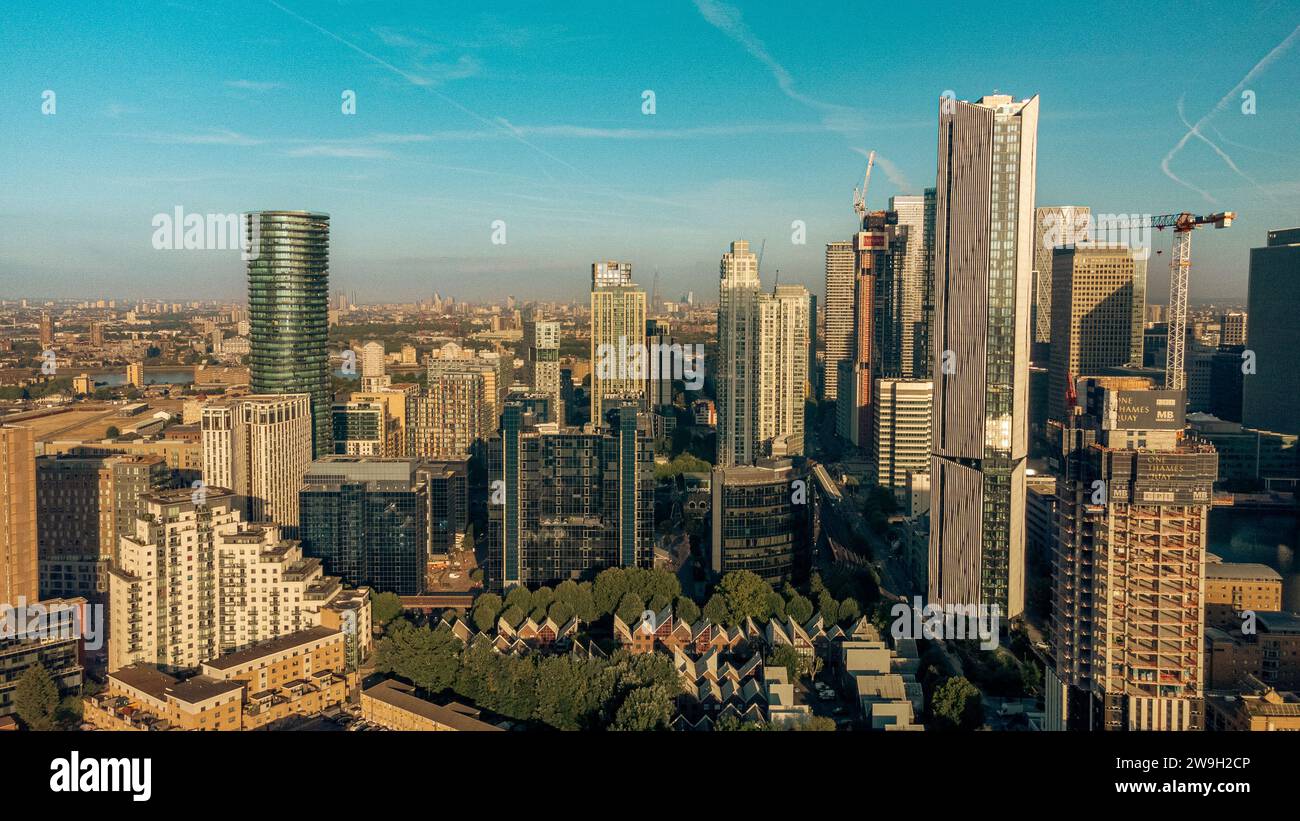 A sprawling city skyline featuring numerous tall buildings with ...