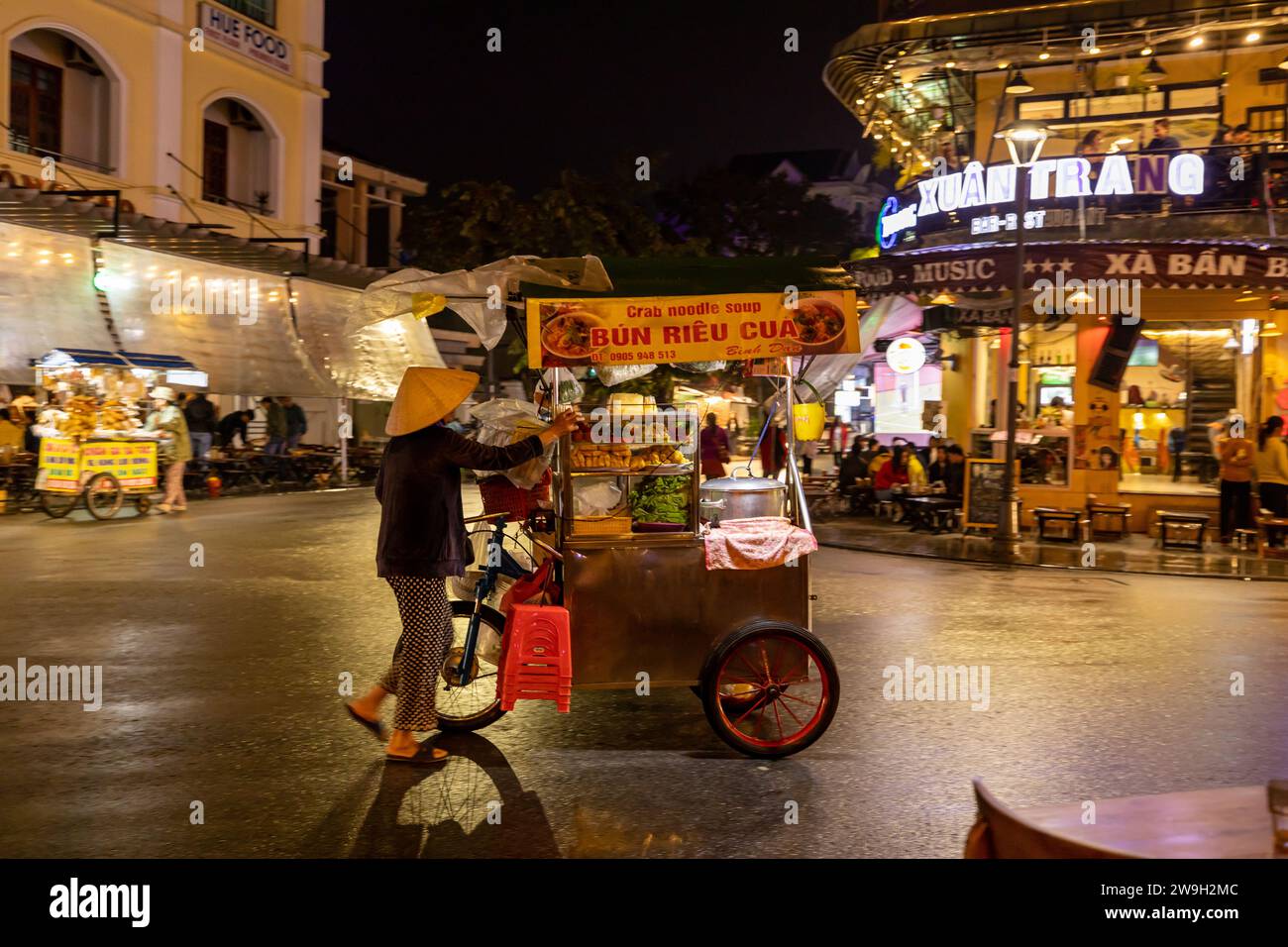 The Citycenter of Hue in Vietnam at night Stock Photo - Alamy