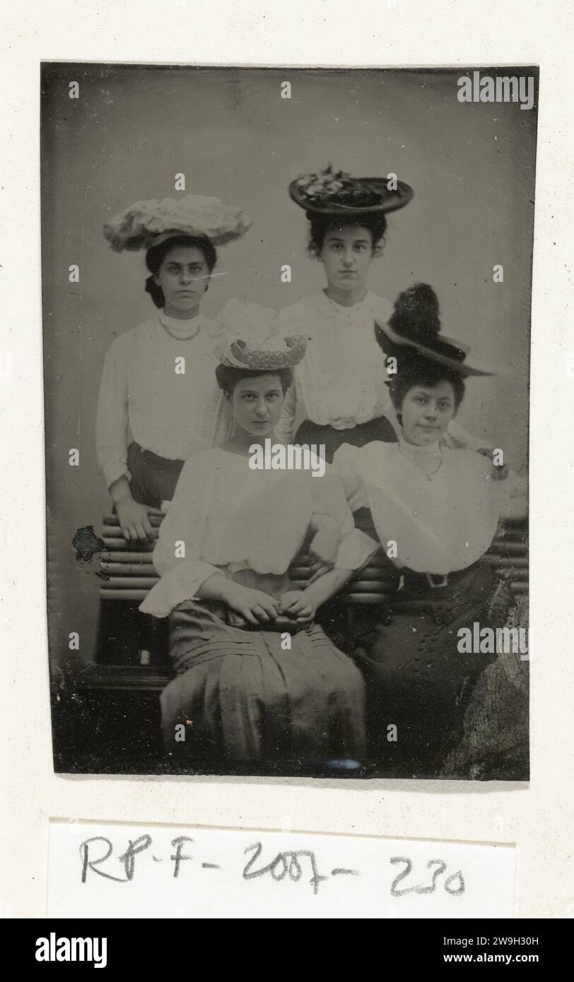 Portrait of four young women with hats, 1906 photograph Two women are ...