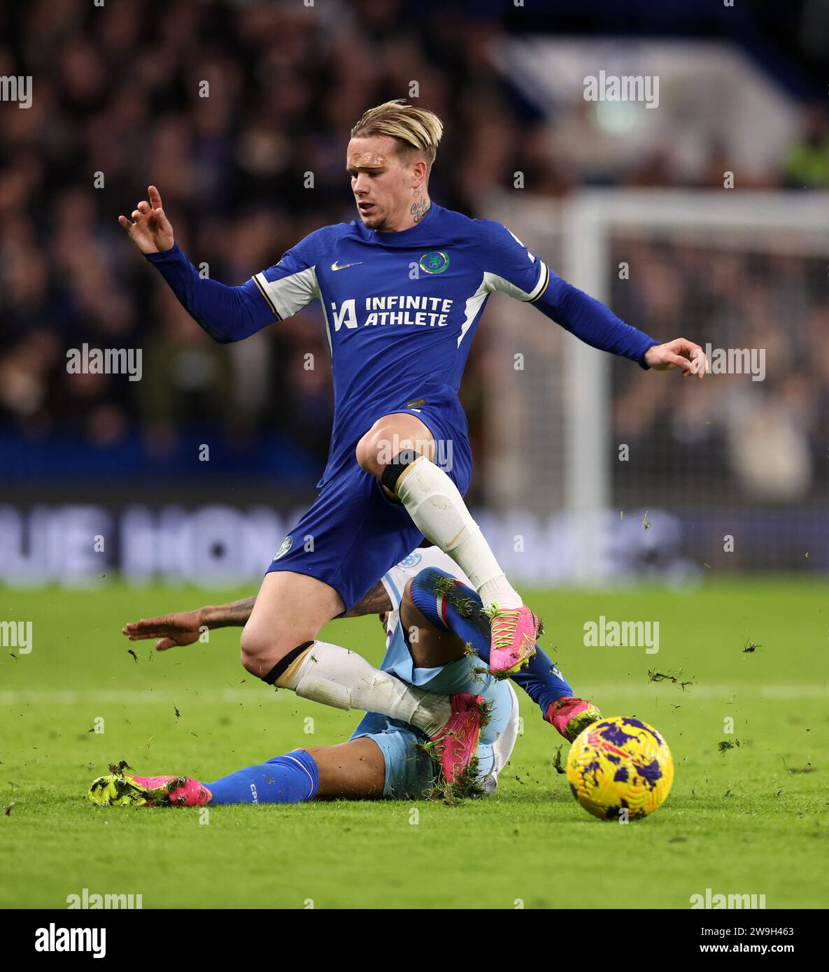 London, UK. 27th Dec, 2023. Mykhaylo Mudryk of Chelsea with Nathaniel ...