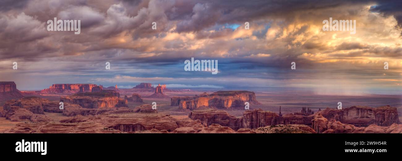 Colorful sunrise panorama of Monument Valley with a rain squall, from ...