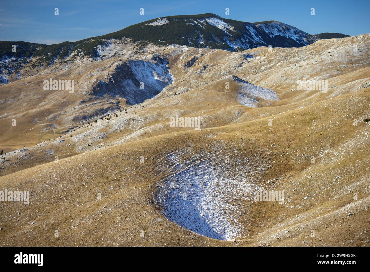 The beauty of untouched wilderness showcased in a panoramic mountain spectacle Stock Photo - Alamy