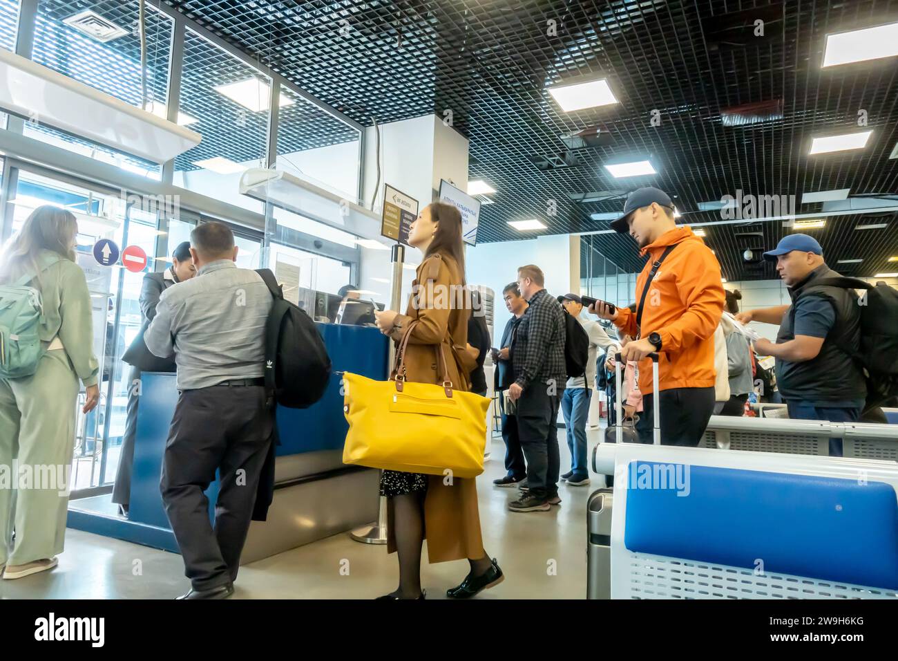 Passengers Checked For Their Tickets And Passports At The Gate In Almaty Airport Kazakhstan