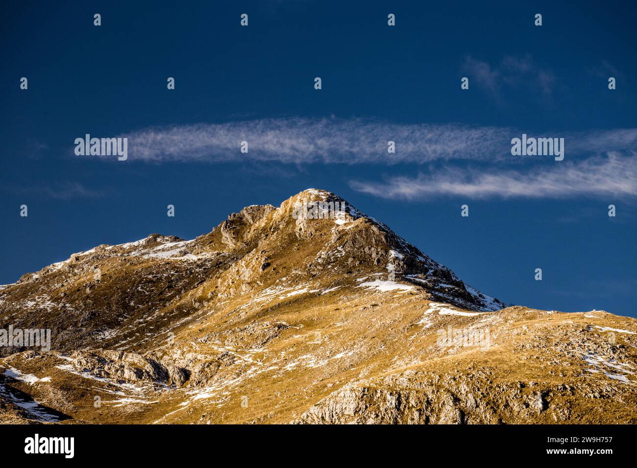 The beauty of untouched wilderness showcased in a panoramic mountain spectacle Stock Photo - Alamy
