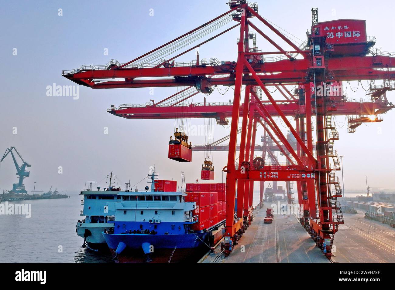 RUGAO, CHINA - DECEMBER 28, 2023 - Cranes unload at Suzhong ...