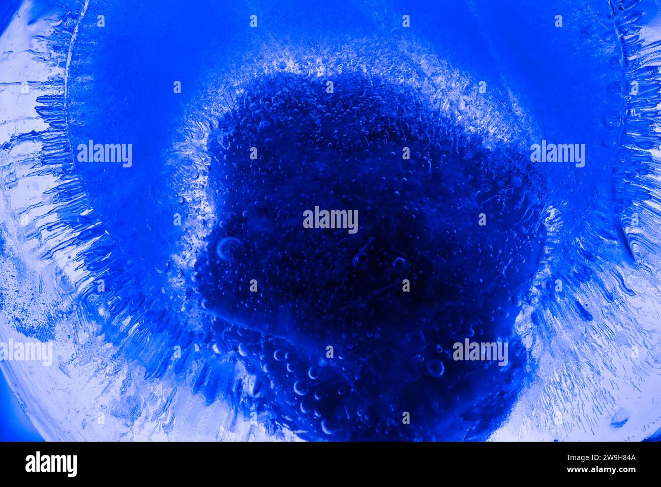 Ice air bubbles illuminated colored hi-res stock photography and images ...