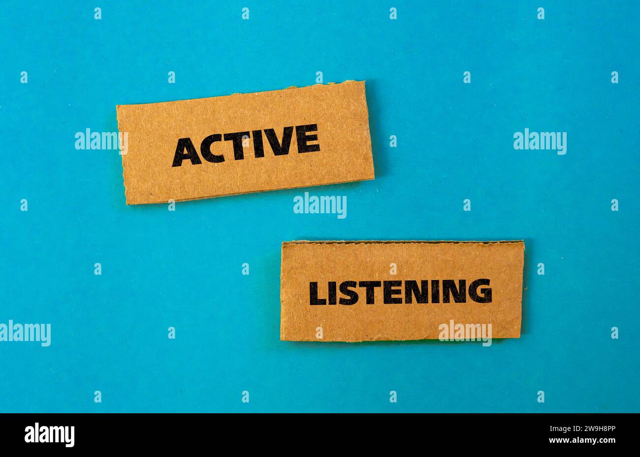 Active listening lettering on ripped paper. Top view, copy space Stock ...