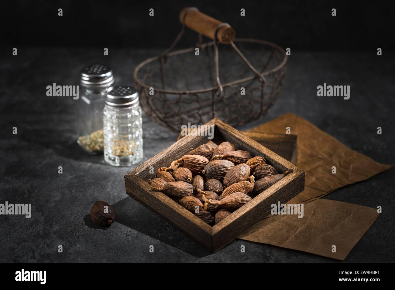 Spices in wooden box:Tsaoko Amomum Fruit Stock Photo - Alamy