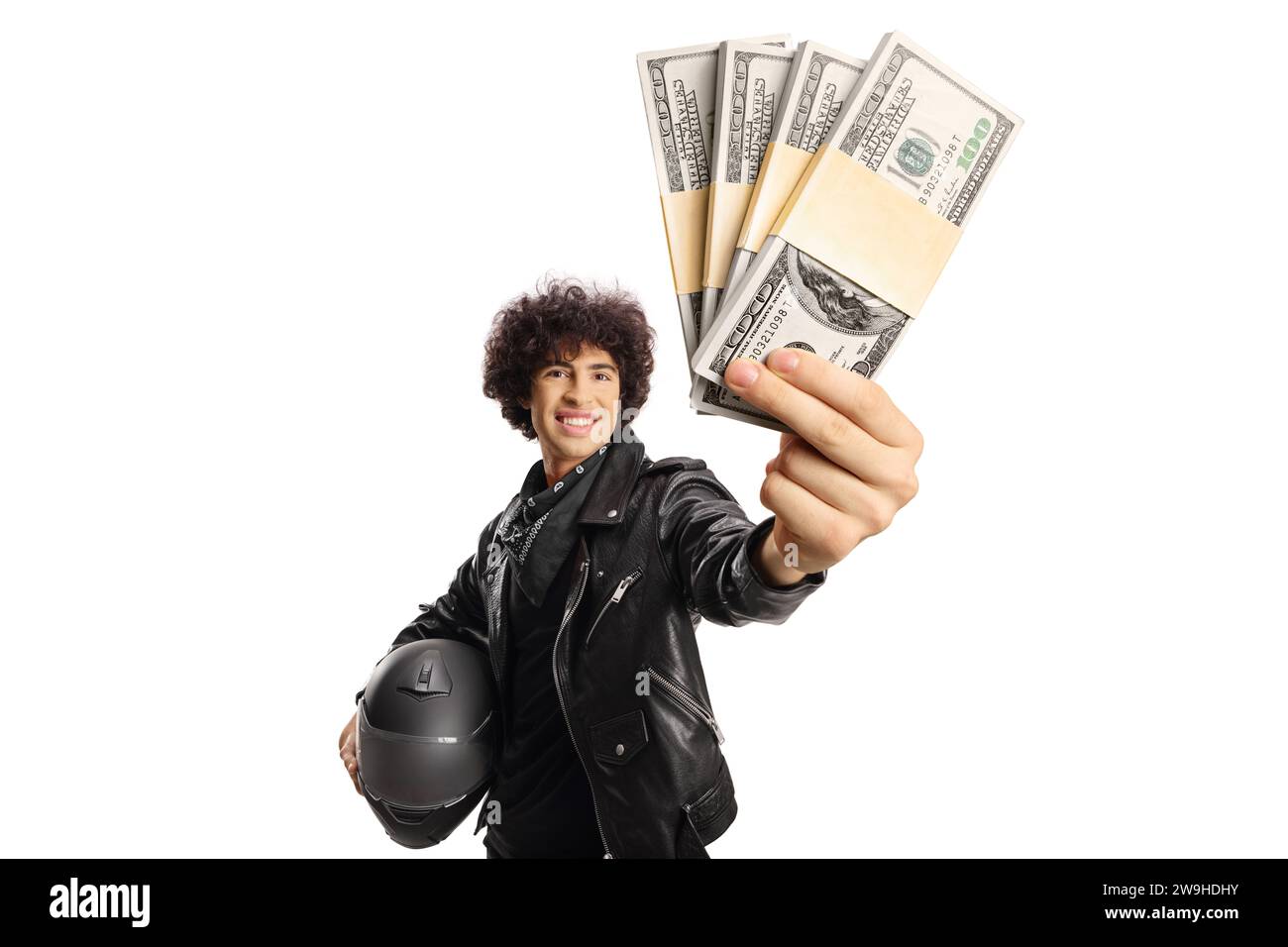 Guy in a black leather jacket holding a helmet and stacks of money ...