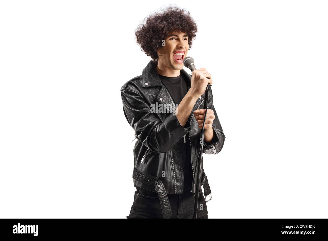 Singer in a leather jacket singing on a microphone isolated on white ...