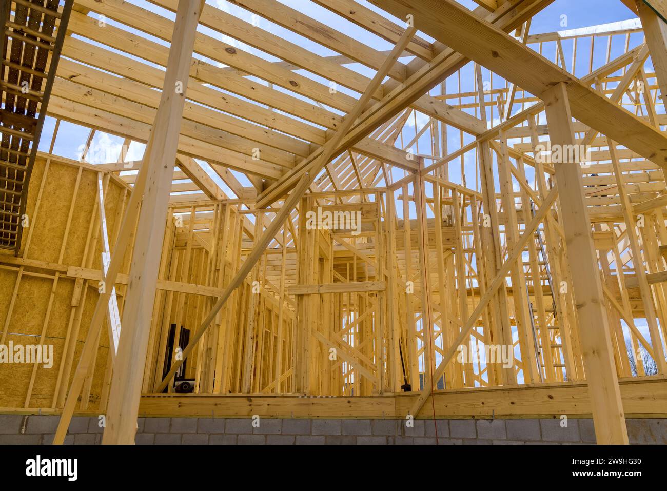 At construction of new home, wooden beam stick frames were constructed ...