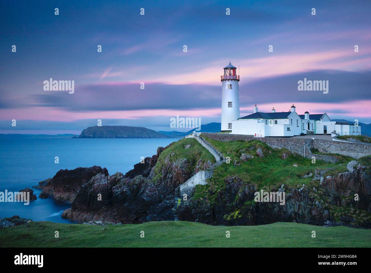 Sun set over Fanad Head Lighthouse and The Atlantic Ocean County ...