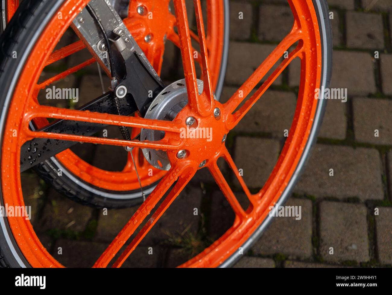 An unusual cast wheel for a bicycle. Bicycle parts Stock Photo - Alamy