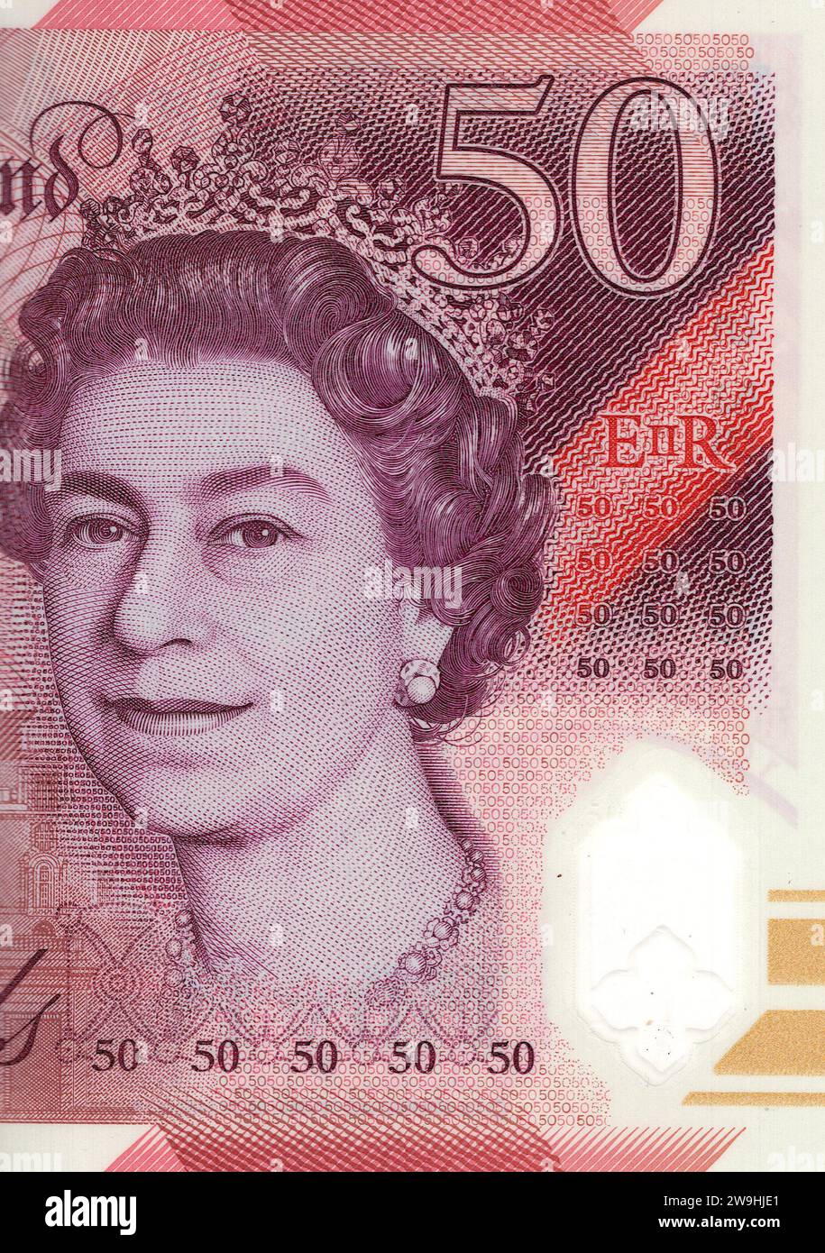 Close up of a fifty pound note featuring a portrait of Queen Elizabeth ...