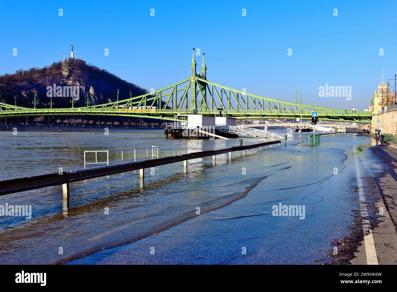 the cresting of the Danube river in Budapest with the Liberty bridge on ...