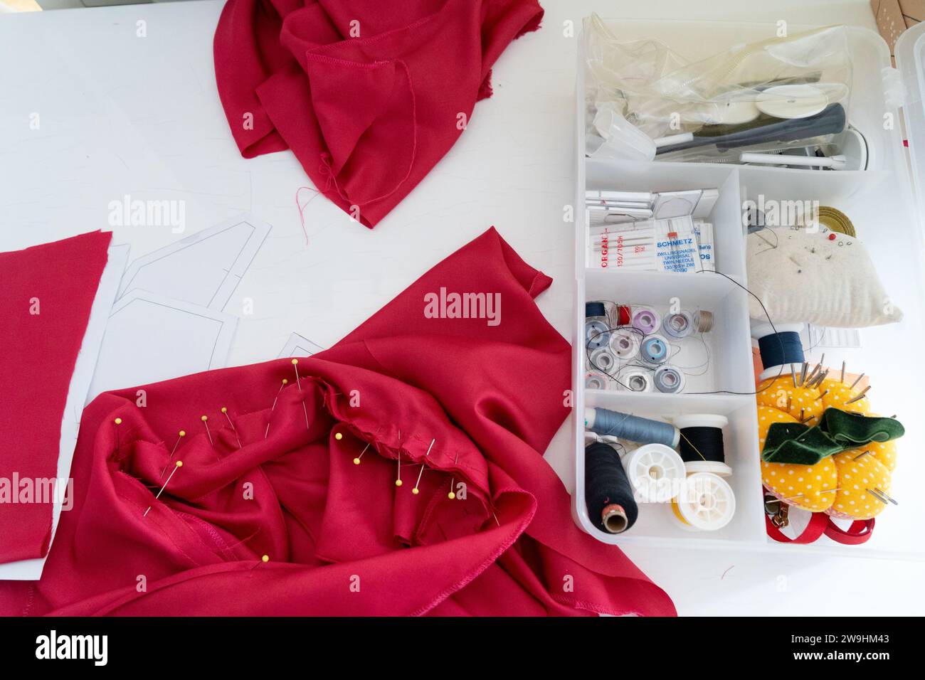 Sewing background with unfinished dress Stock Photo - Alamy