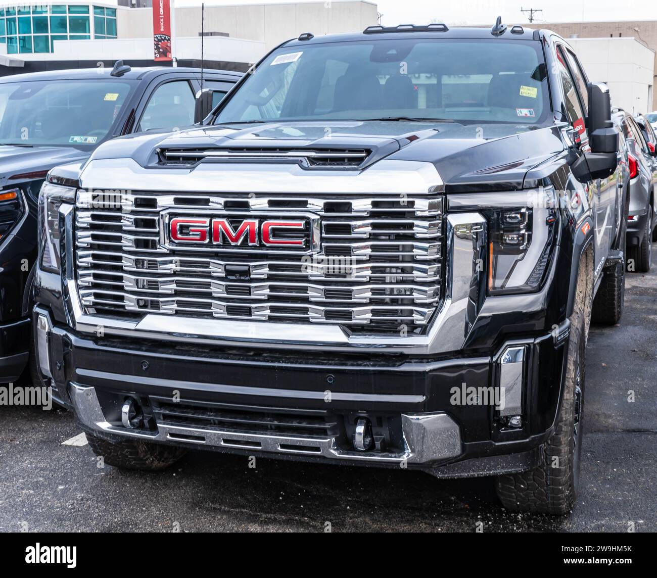A new GMC four door pickup truck for sale at a dealership in ...