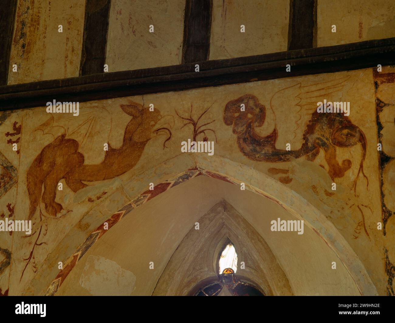 Medieval paintings of a fruit tree flanked by imaginary beasts on the ...